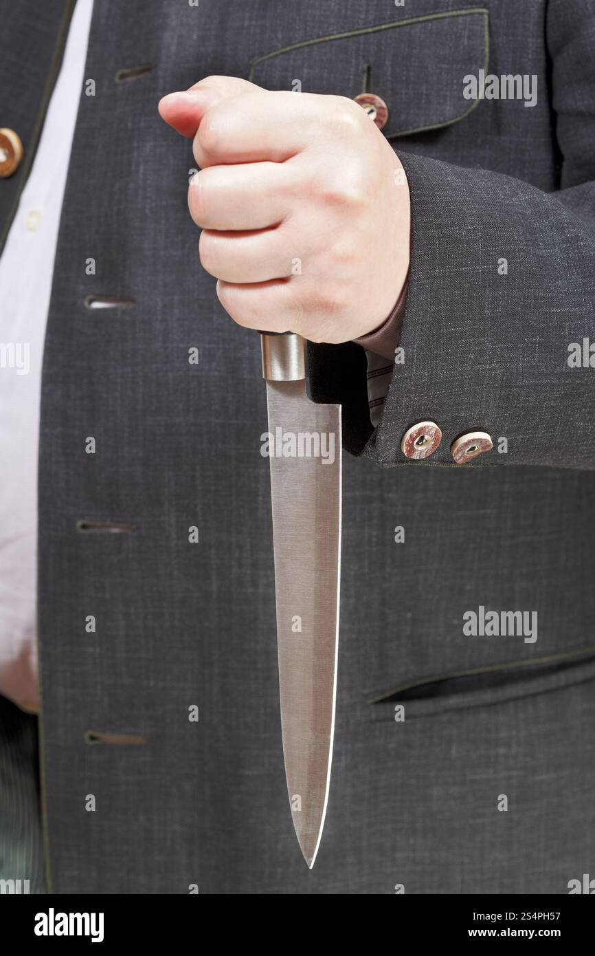 Kitchen knife in hand hi-res stock photography and images - Alamy