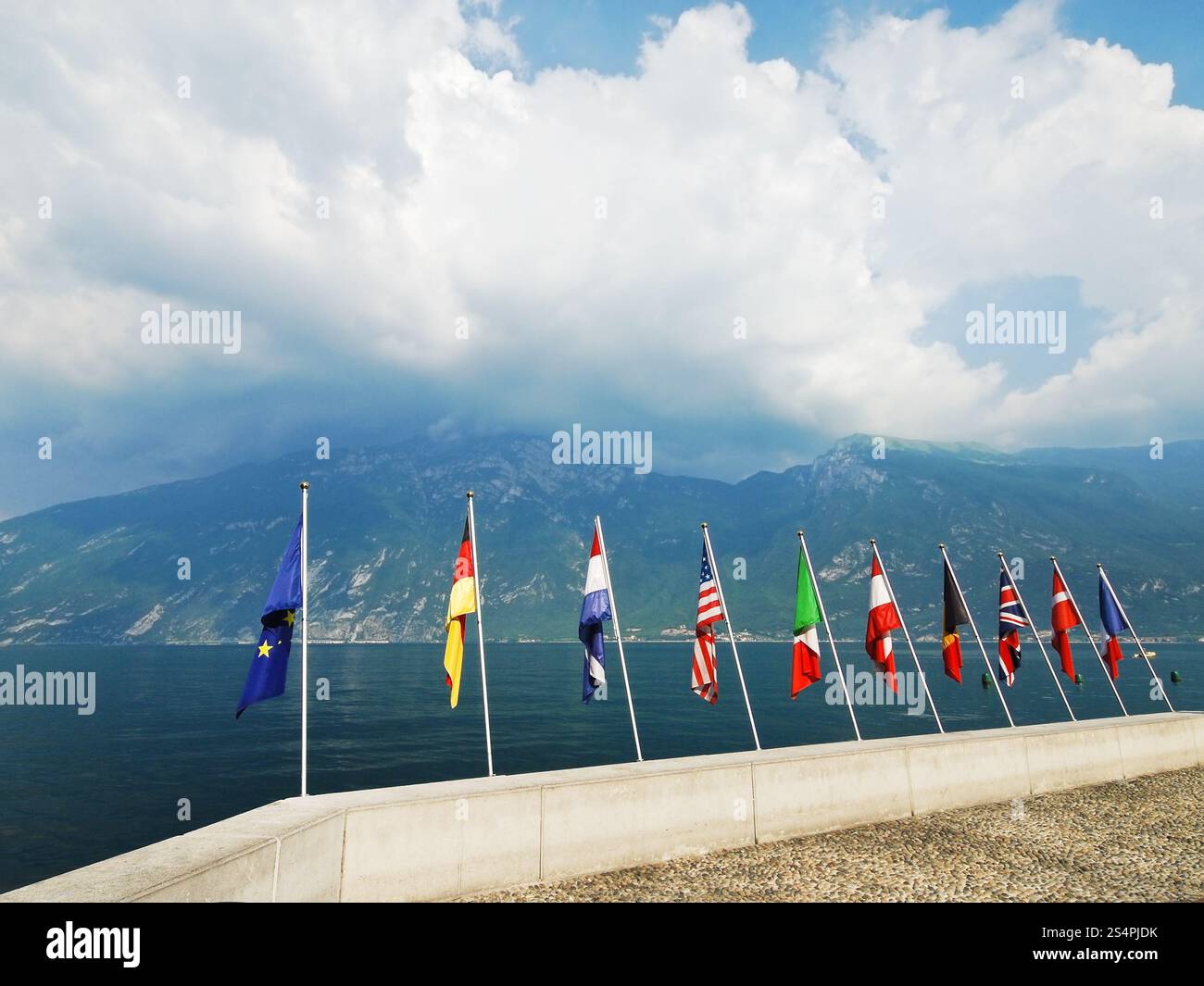 Flags of European countries over Garda lake, Italy Stock Photo - Alamy