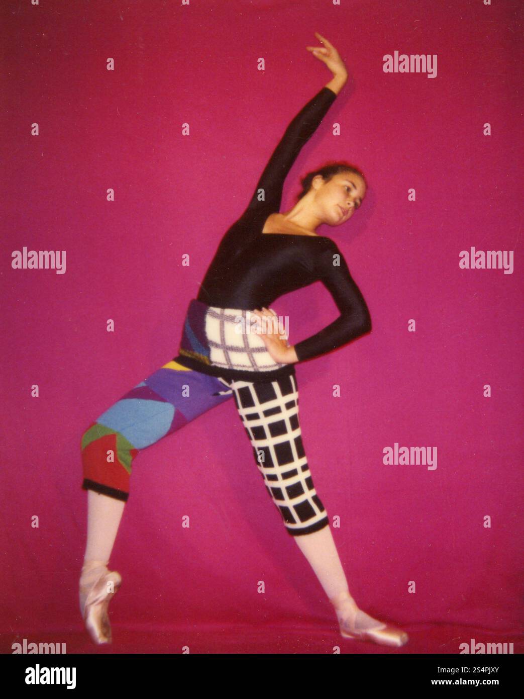 Girl in colorful outfit performing a ballet position, Italy 1980s Stock ...