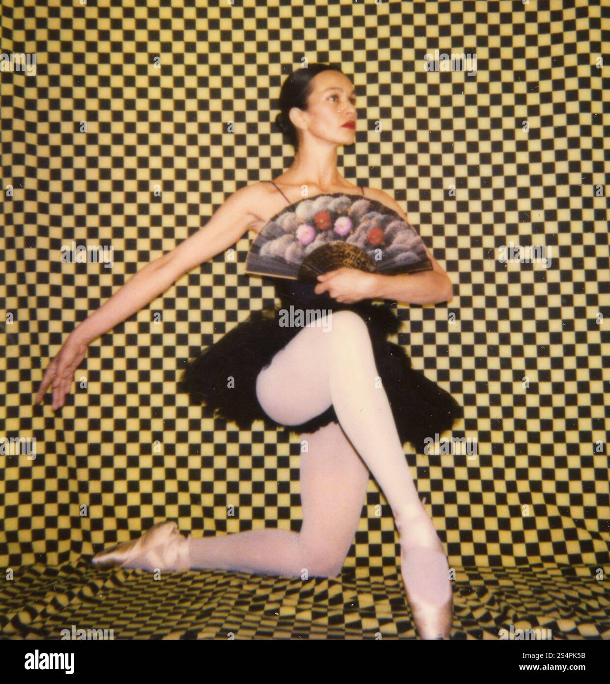 Girl in black ballet outfit performing a position, Italy 1980s Stock ...