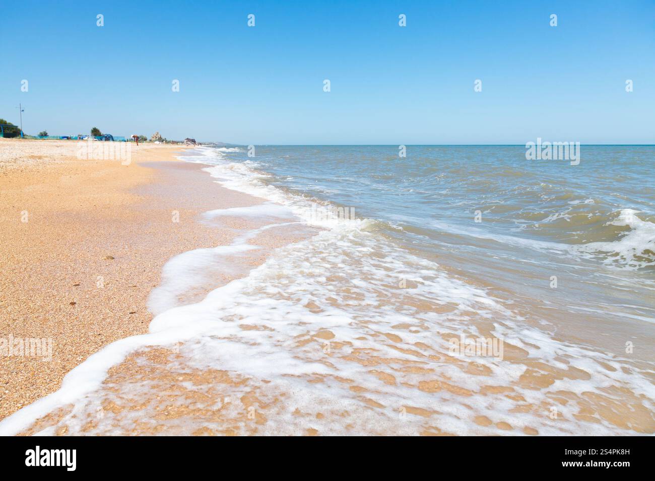 sand and seashells beach of Sea of Azov in resort village Golubickaya ...