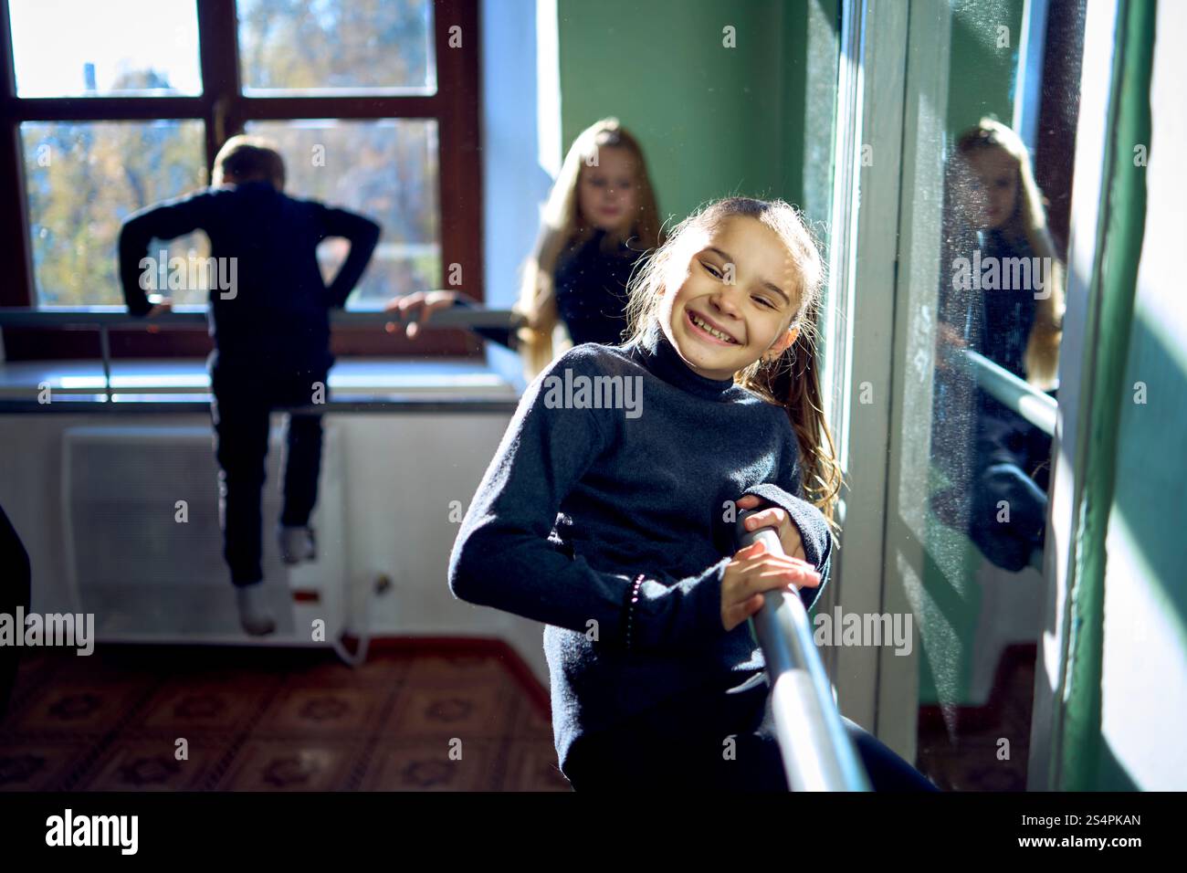 group of pre-teens perform a teacher's task during an acting class ...