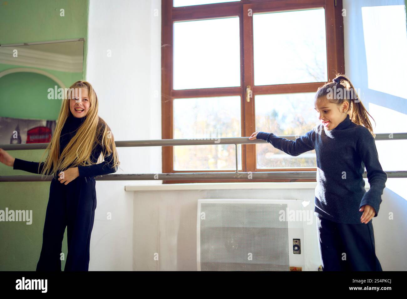group of pre-teens perform a teacher's task during an acting class ...