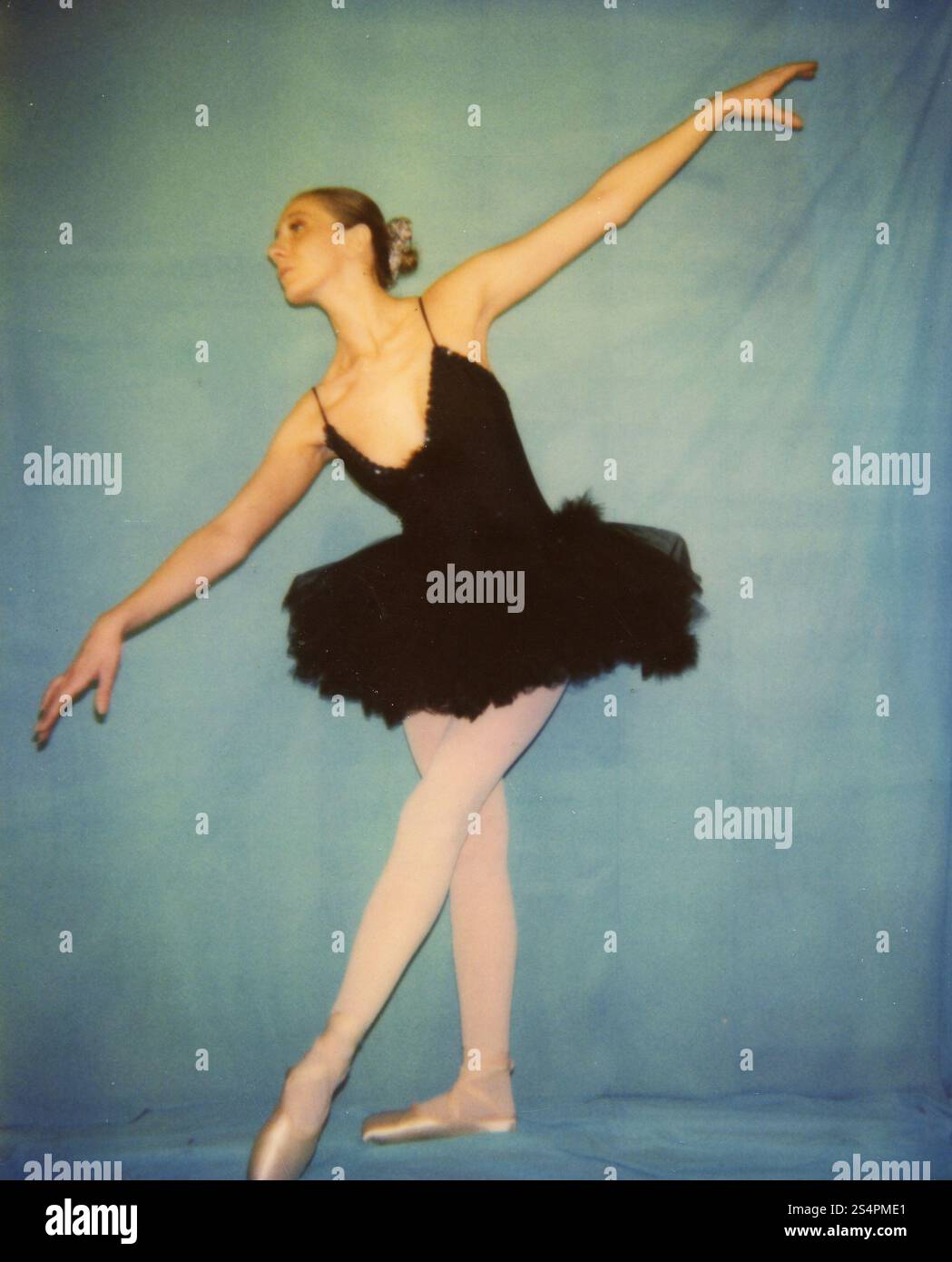 Girl in black ballet outfit performing a position, Italy 1980s Stock ...