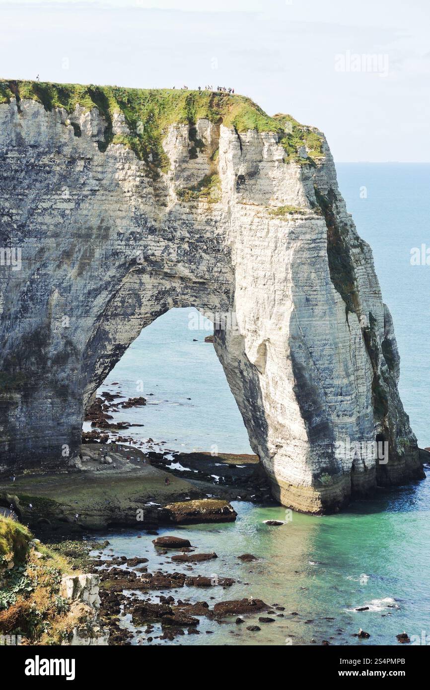 view of rock with arch on english channel beach of Eretrat cote d ...