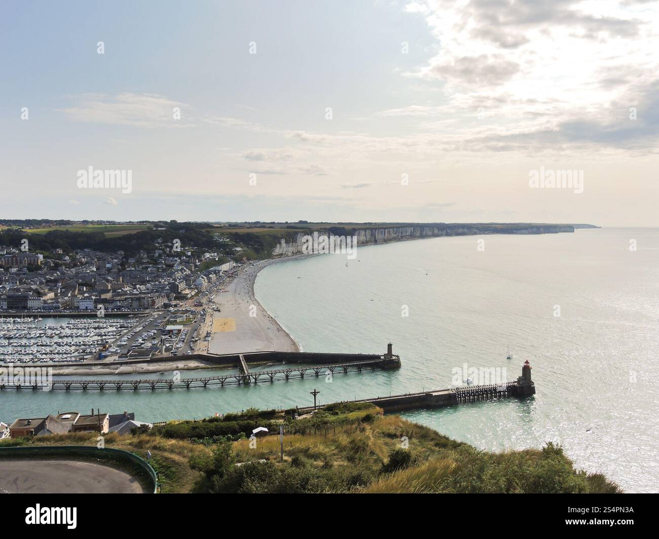 above view of English Channel coast and Etretat town in Normandy ...
