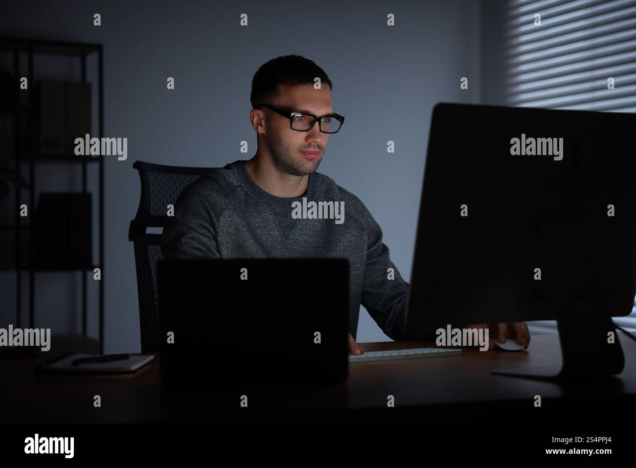 Programmer workspace night coding hi-res stock photography and images ...