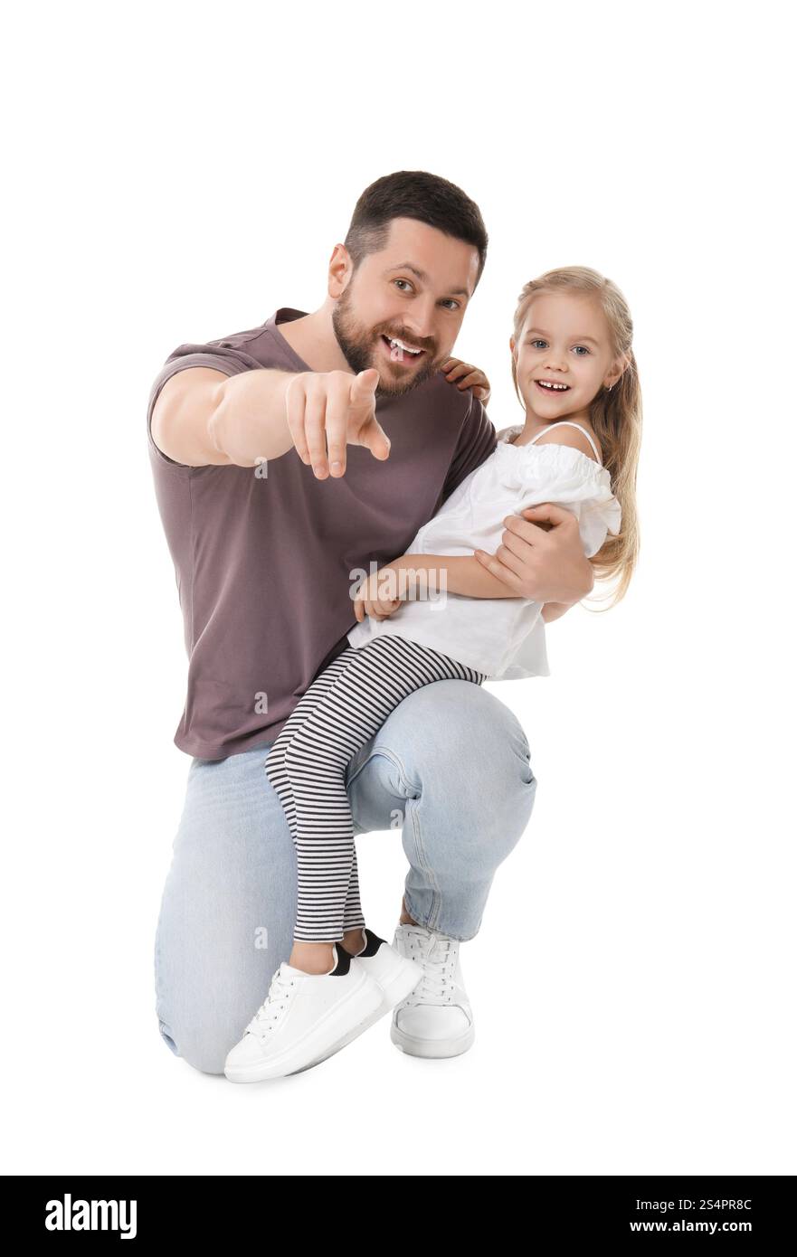 Happy father and his cute little daughter looking at camera on white background Stock Photo - Alamy