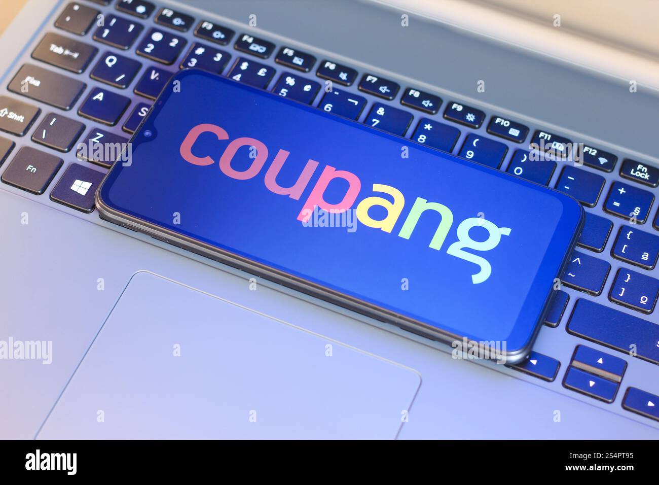 Canada. 13th Jan, 2025. In this photo illustration, the Coupang logo is seen displayed on a ...