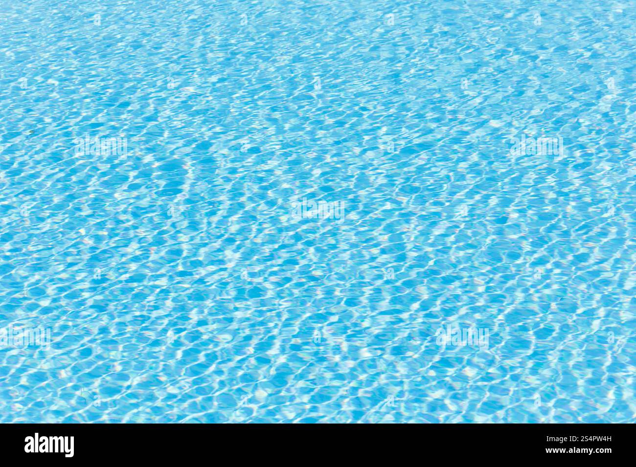 Patterns of sunlight rippling on a swimming pool water surface Stock ...