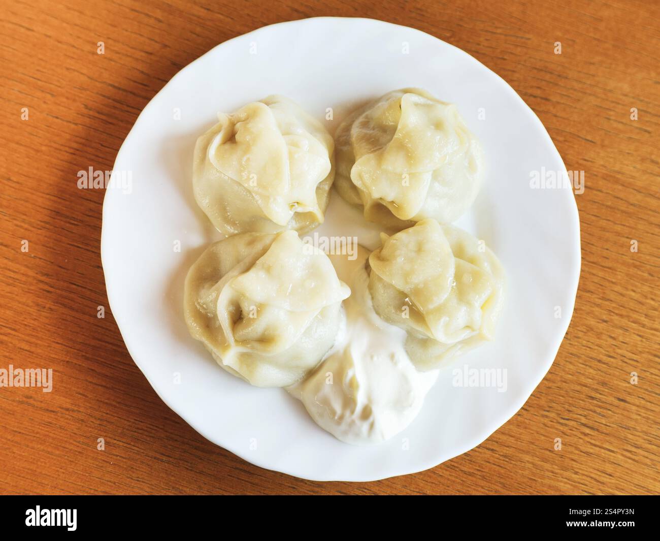 Crimean tatar cuisine - top view of manti dumpling on white plate Stock ...