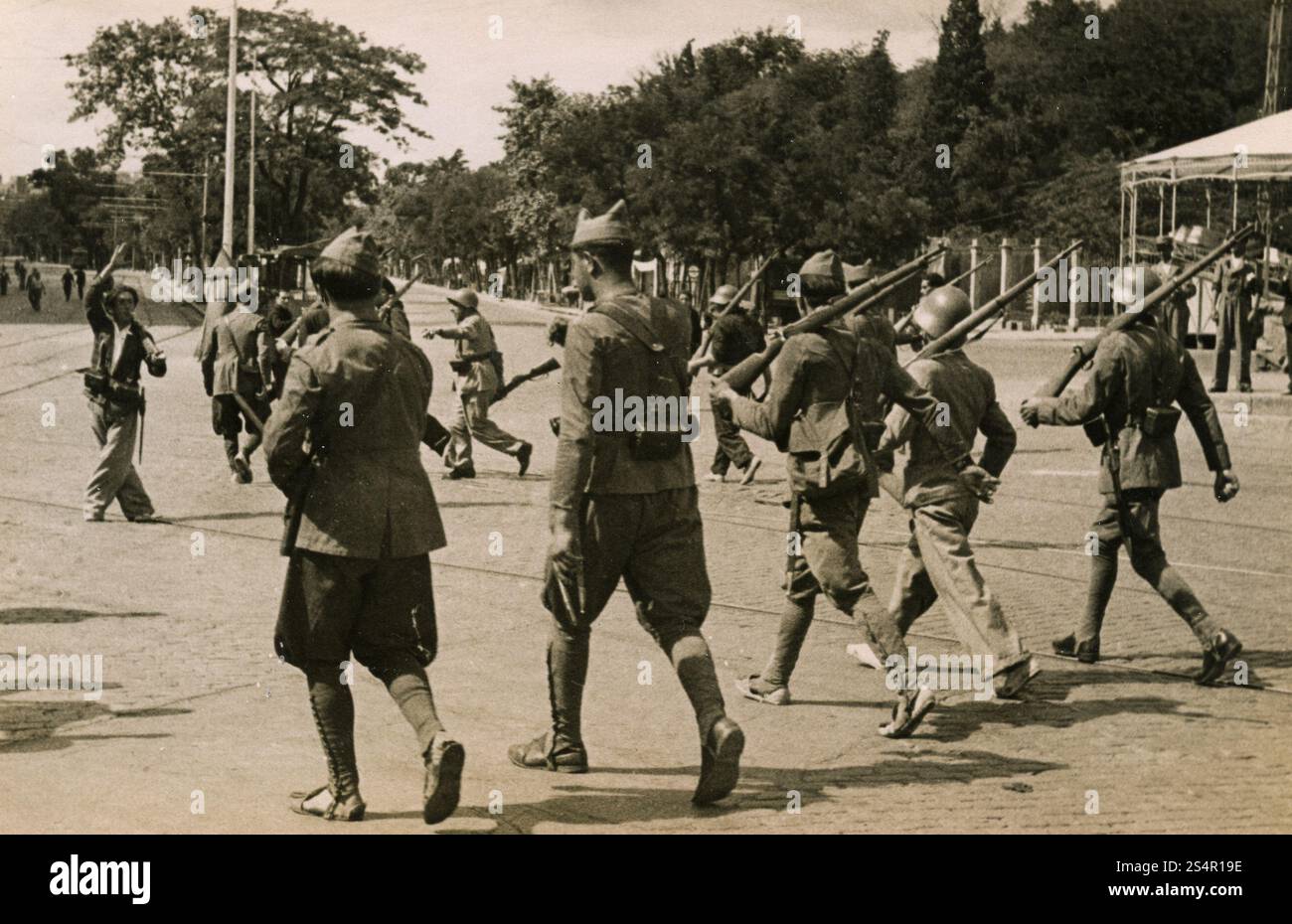 Groups of soldiers of the Pacific troops parade through the streets of ...