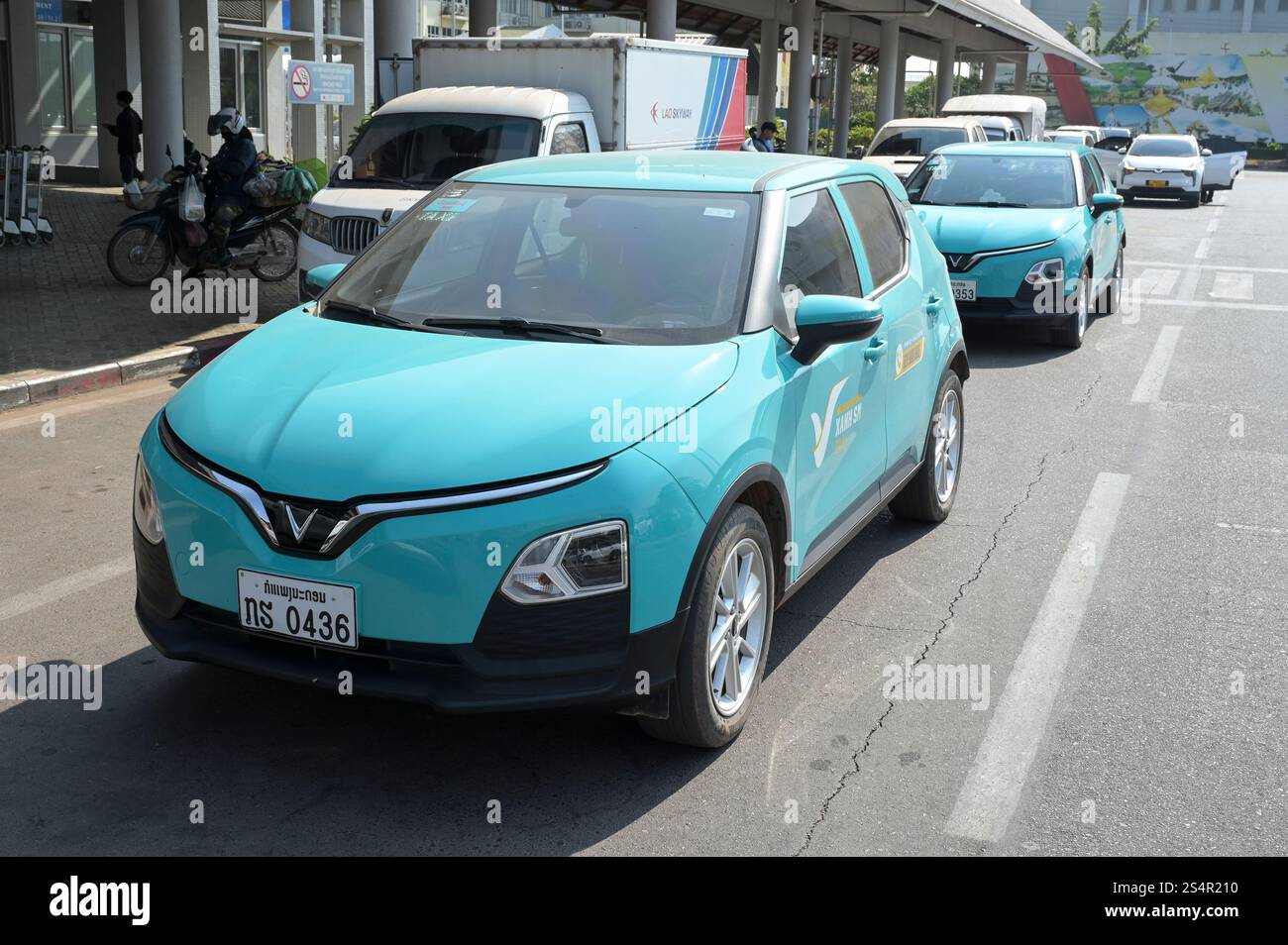 LAO P.D.R., Vientiane, vietnamese Vinfast electric car of APP Taxi ...