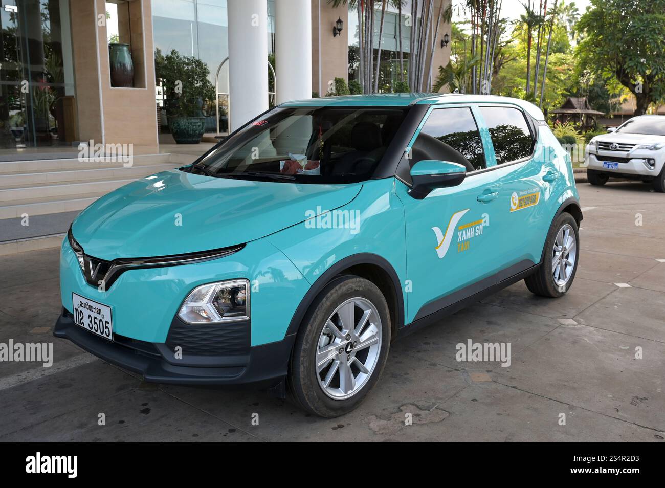 LAO P.D.R., Pakse, vietnamese Vinfast electric car of APP Taxi company ...