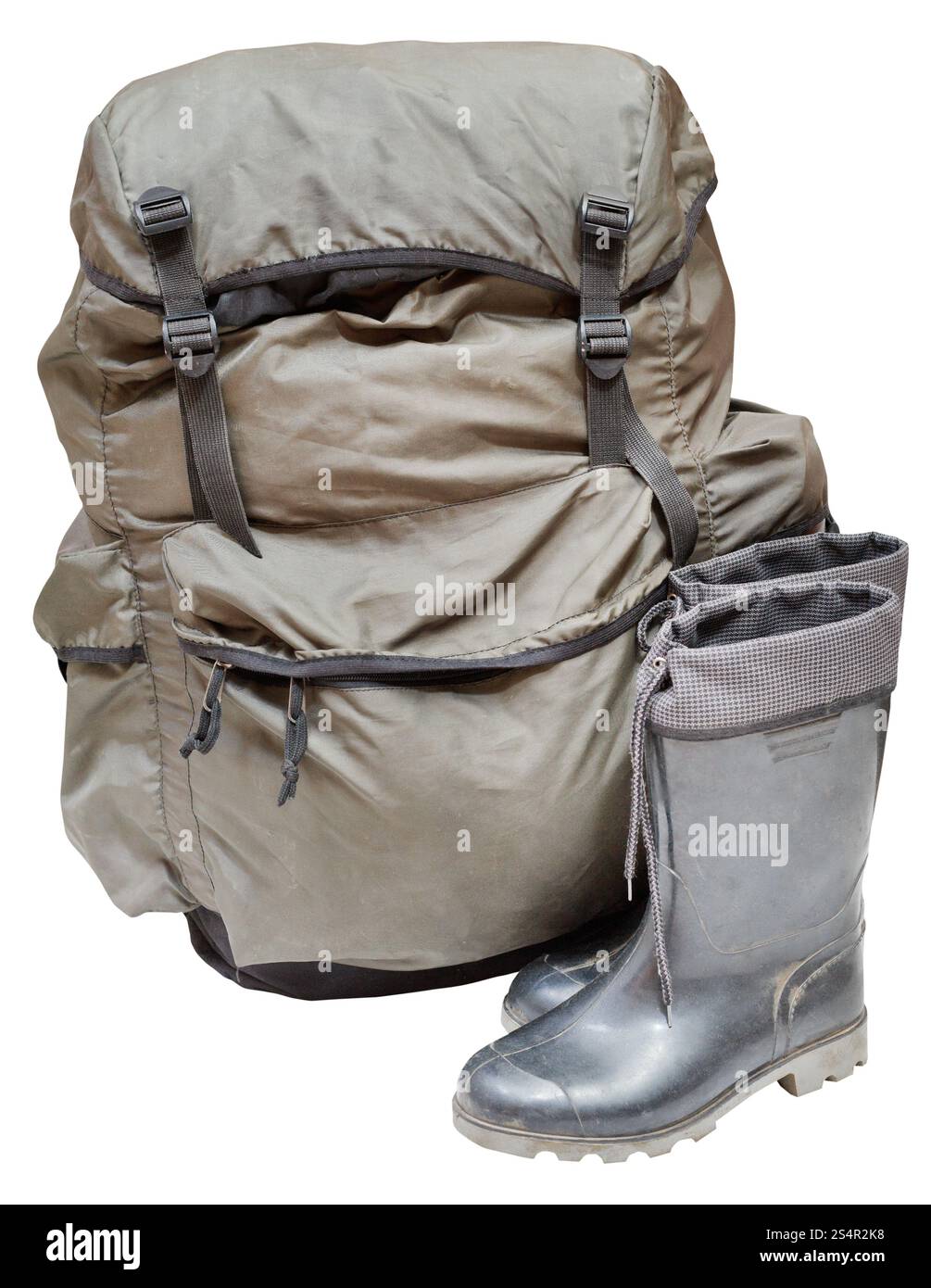 backpack and rubber boots isolated on white background Stock Photo - Alamy