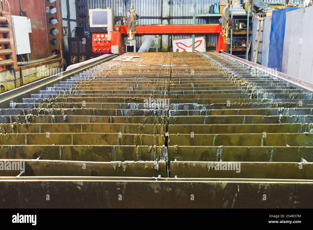 CNC oxy-fuel and plasma torches cutting machine close up in mechanical ...