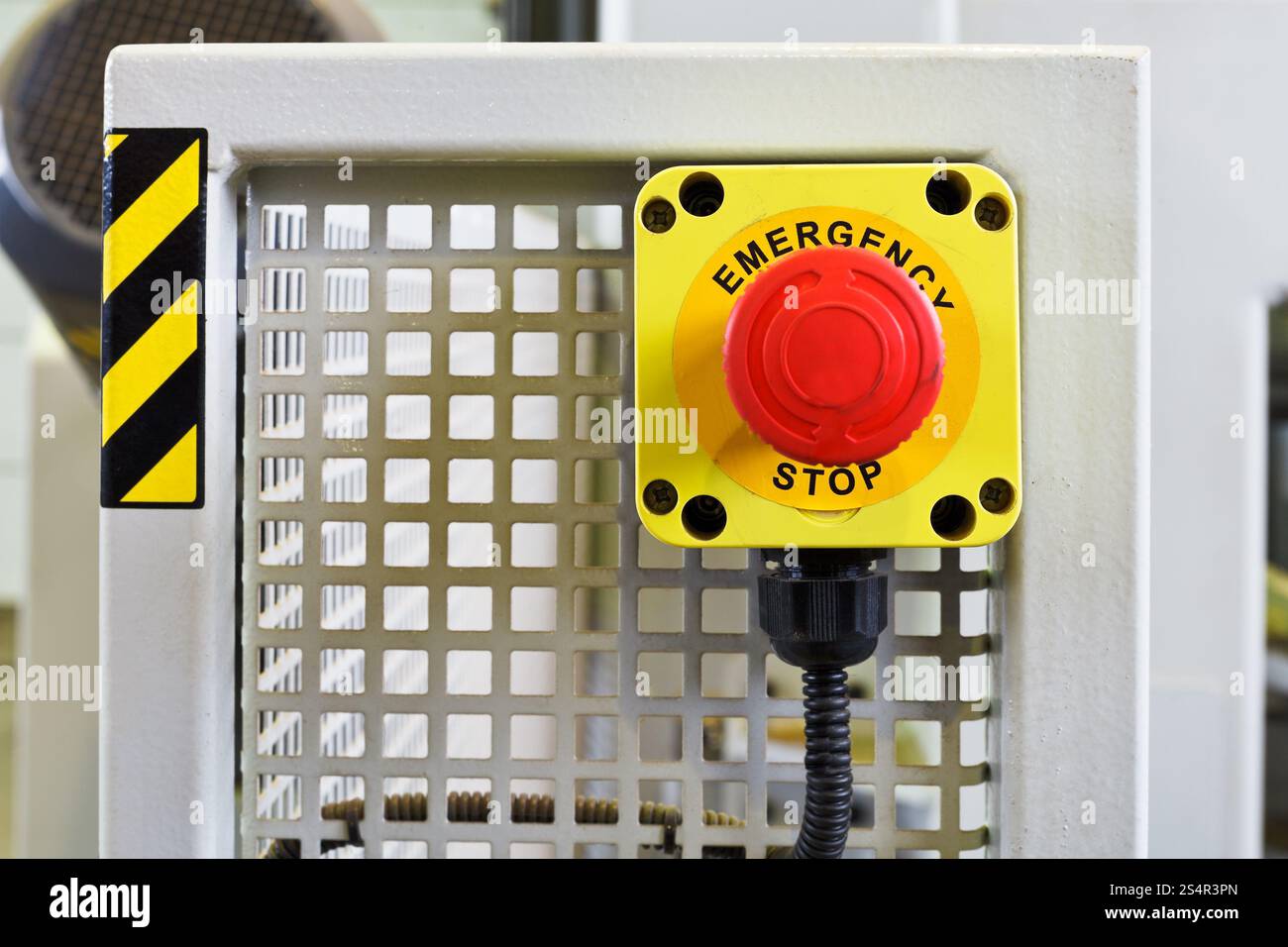red emergency stop push button on engine close up Stock Photo - Alamy