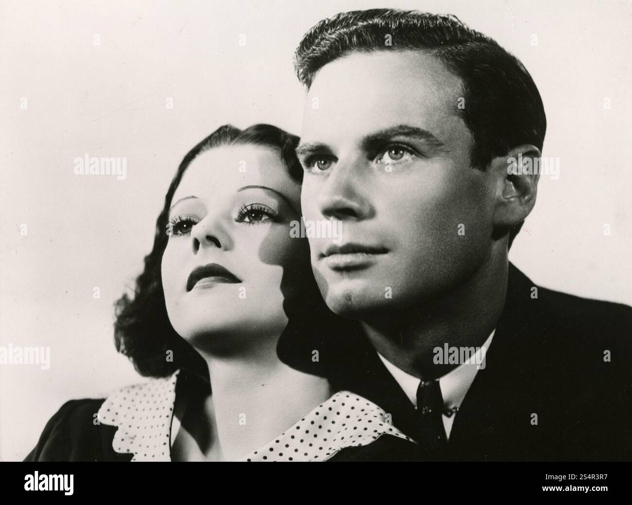 Actors Heather Angel and Norman Foster in the movie Orient Express, USA ...