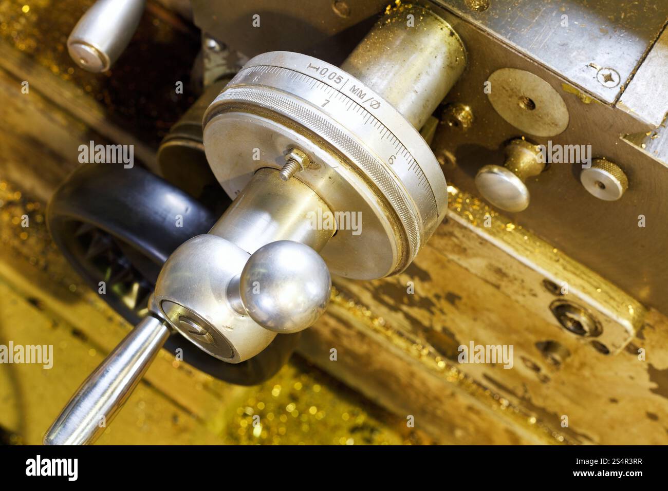 scale handle of carriage of metal lathe machine in turning workshop ...