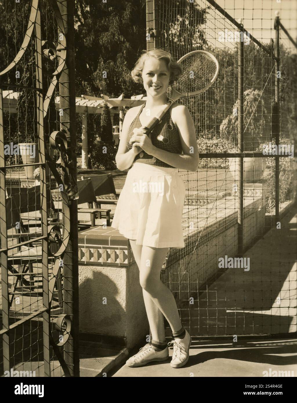 Actress Sally Eilers in tennis outfit, USA 1930s Stock Photo - Alamy