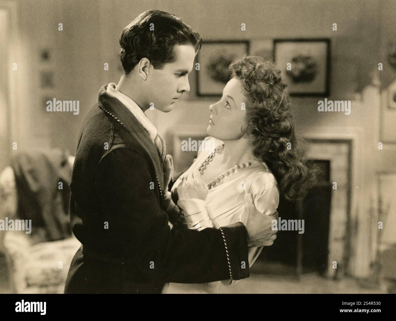 Actors Johnny Downs and Susan Hayward in the movie Adam Had Four Sons ...