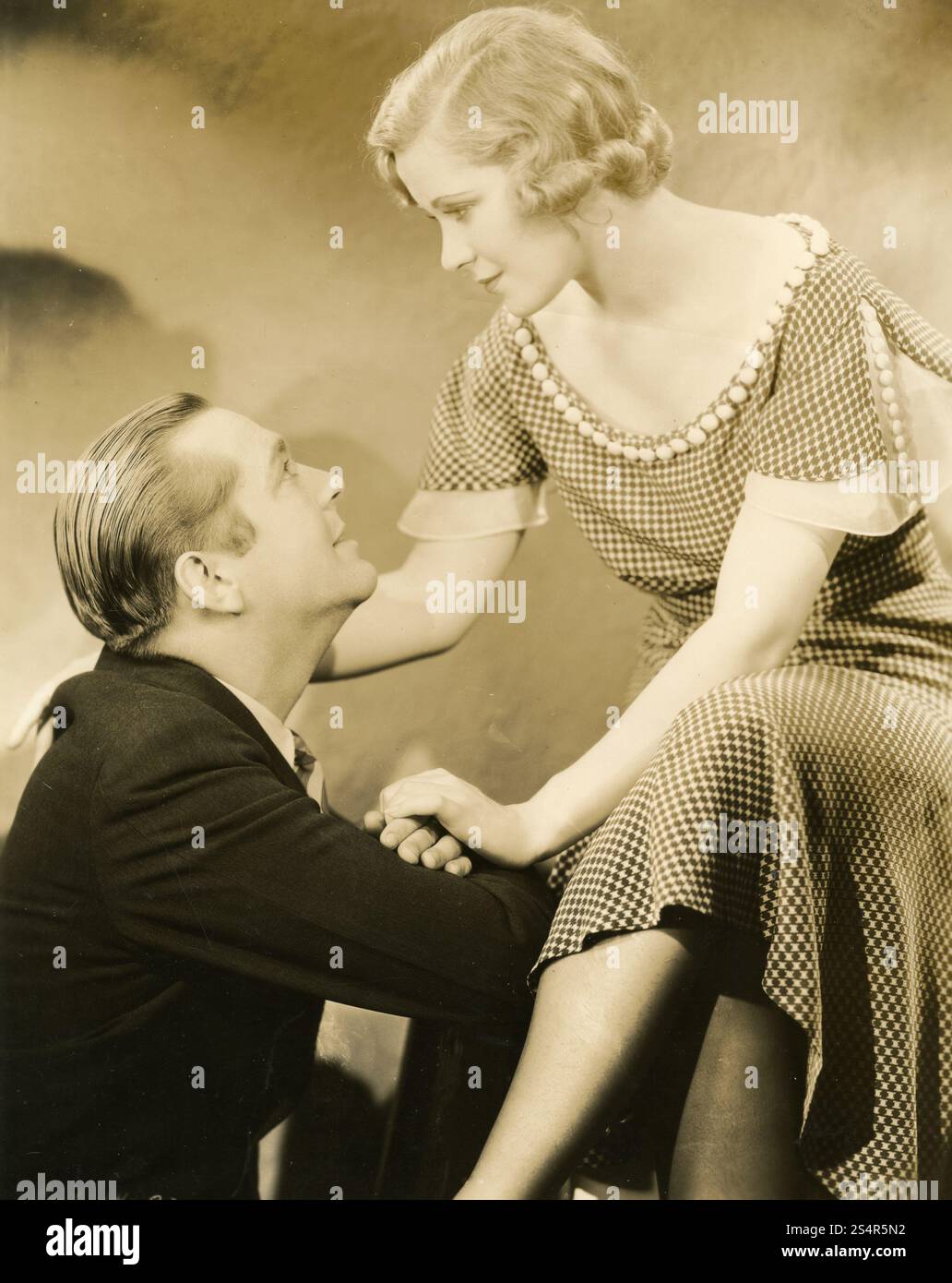 American actor James Dunn and actress Boots Mallory in the movie Handle with Care, USA 1932 ...