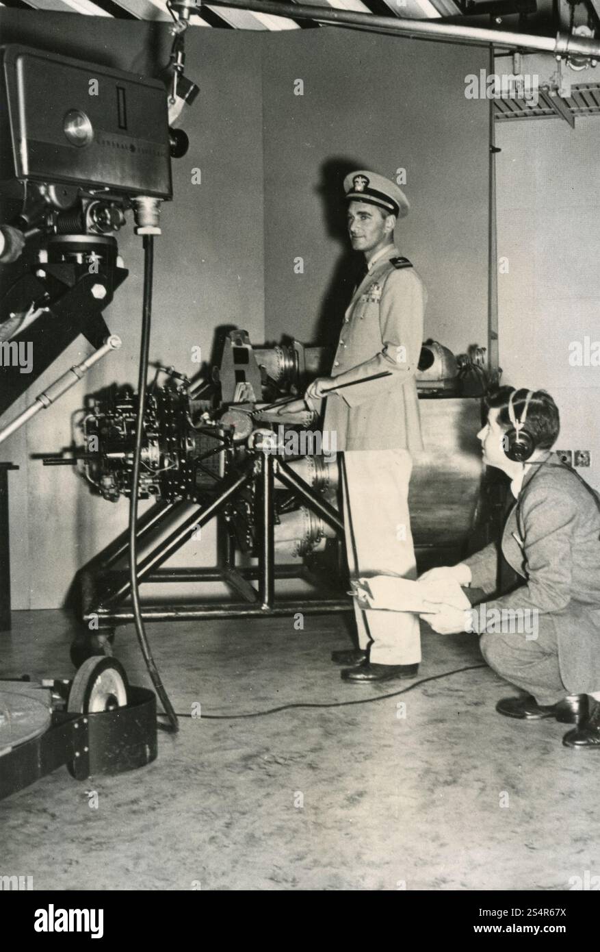 A US Navy instructor officer explaining the working of a turbo-jet ...