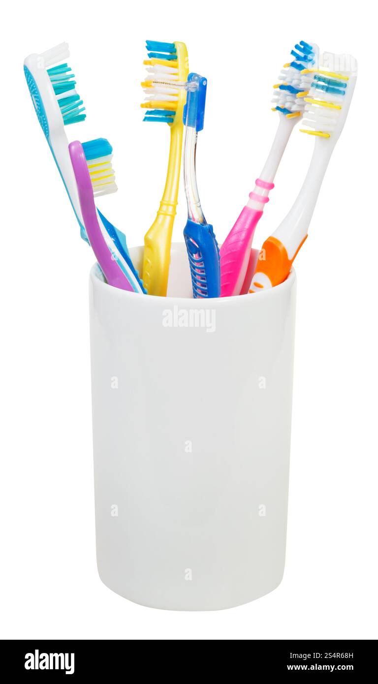 five tooth brushes and interdental brush Stock Photo - Alamy
