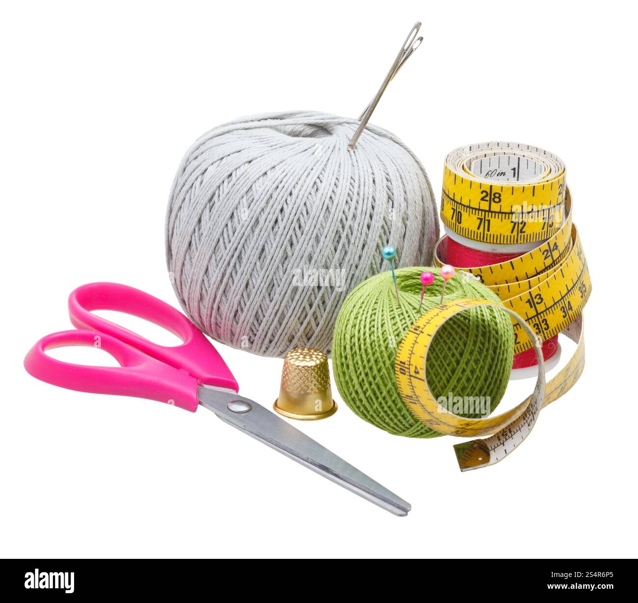 several sewing items isolated on white background Stock Photo - Alamy