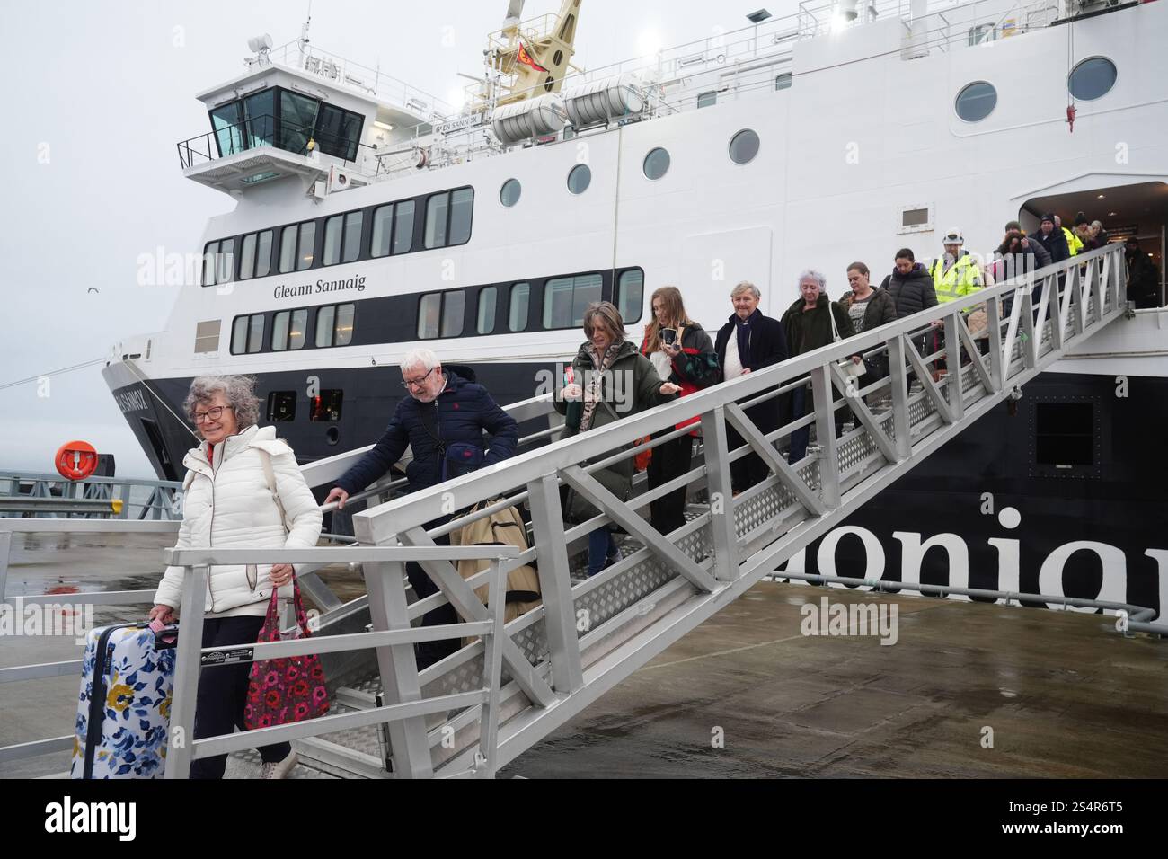 Passengers depart The Glen Sannox ferry after arriving in Troon from ...