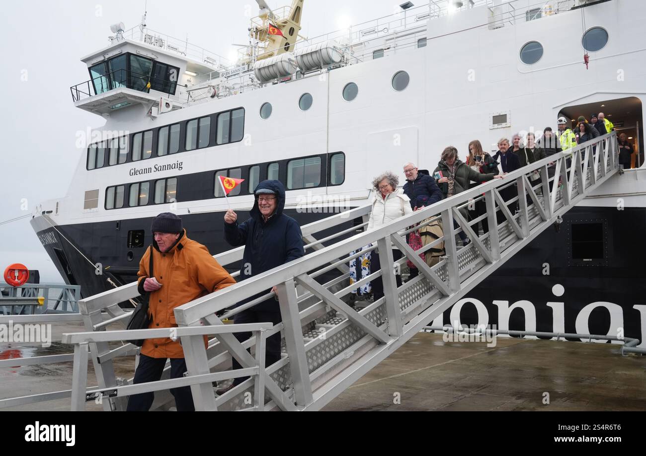 Passengers depart The Glen Sannox ferry after arriving in Troon from ...