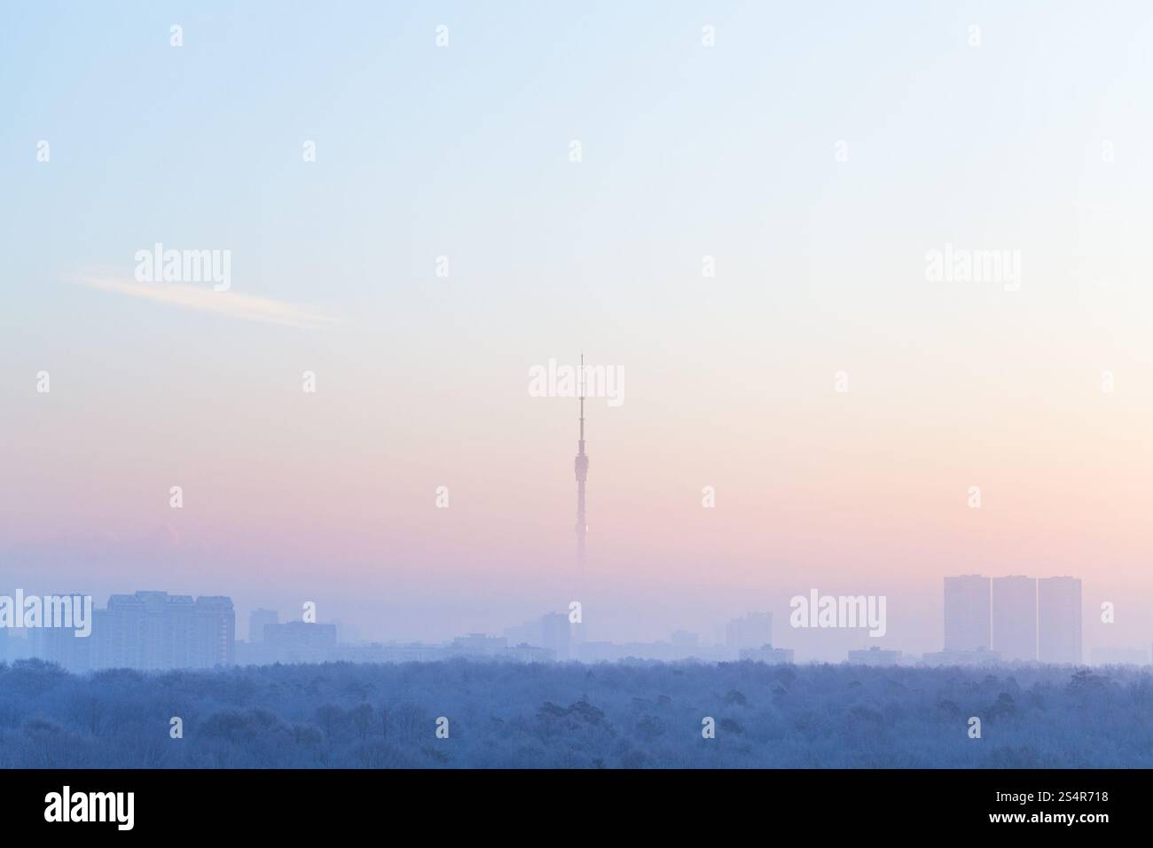 blue and pink sky over city and TV tower in cold winter sunrise Stock ...