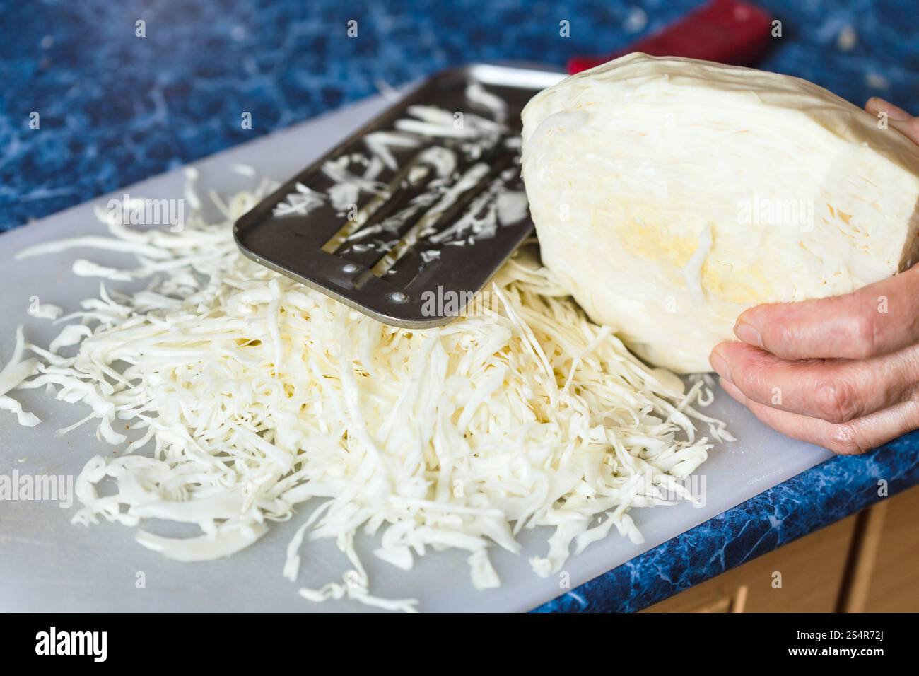 Woman in kitchen knife shred hi-res stock photography and images - Alamy