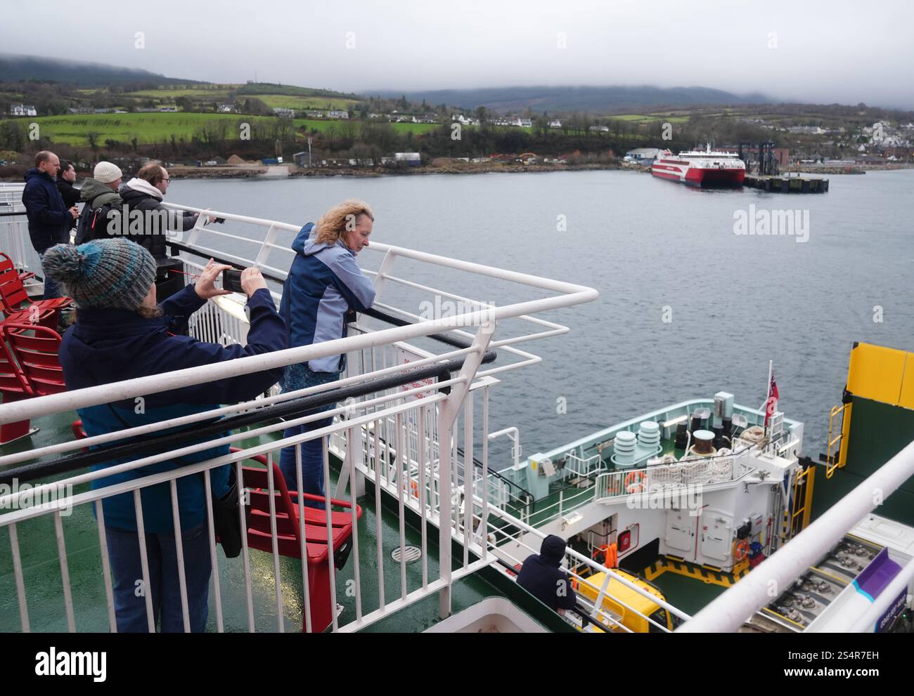 Passengers onboard The Glen Sannox ferry as it departs Brodick on Isle ...