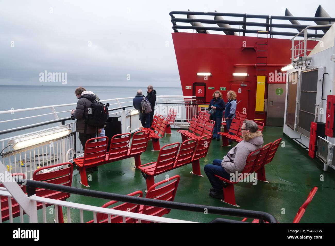 Passengers onboard The Glen Sannox ferry as it departs Brodick on Isle ...