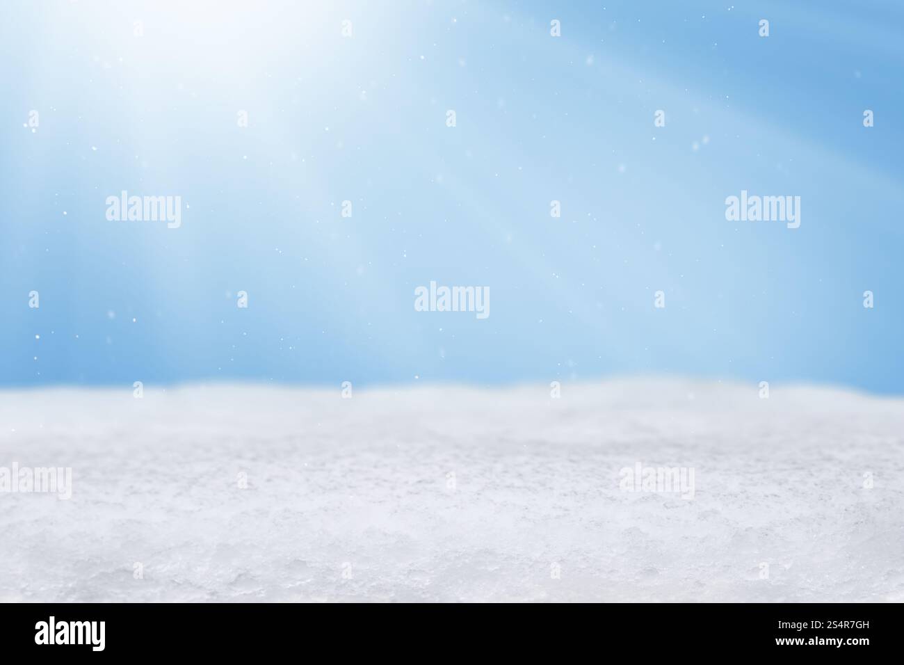Christmas background with snowdrift, falling snow and sun rays with ...