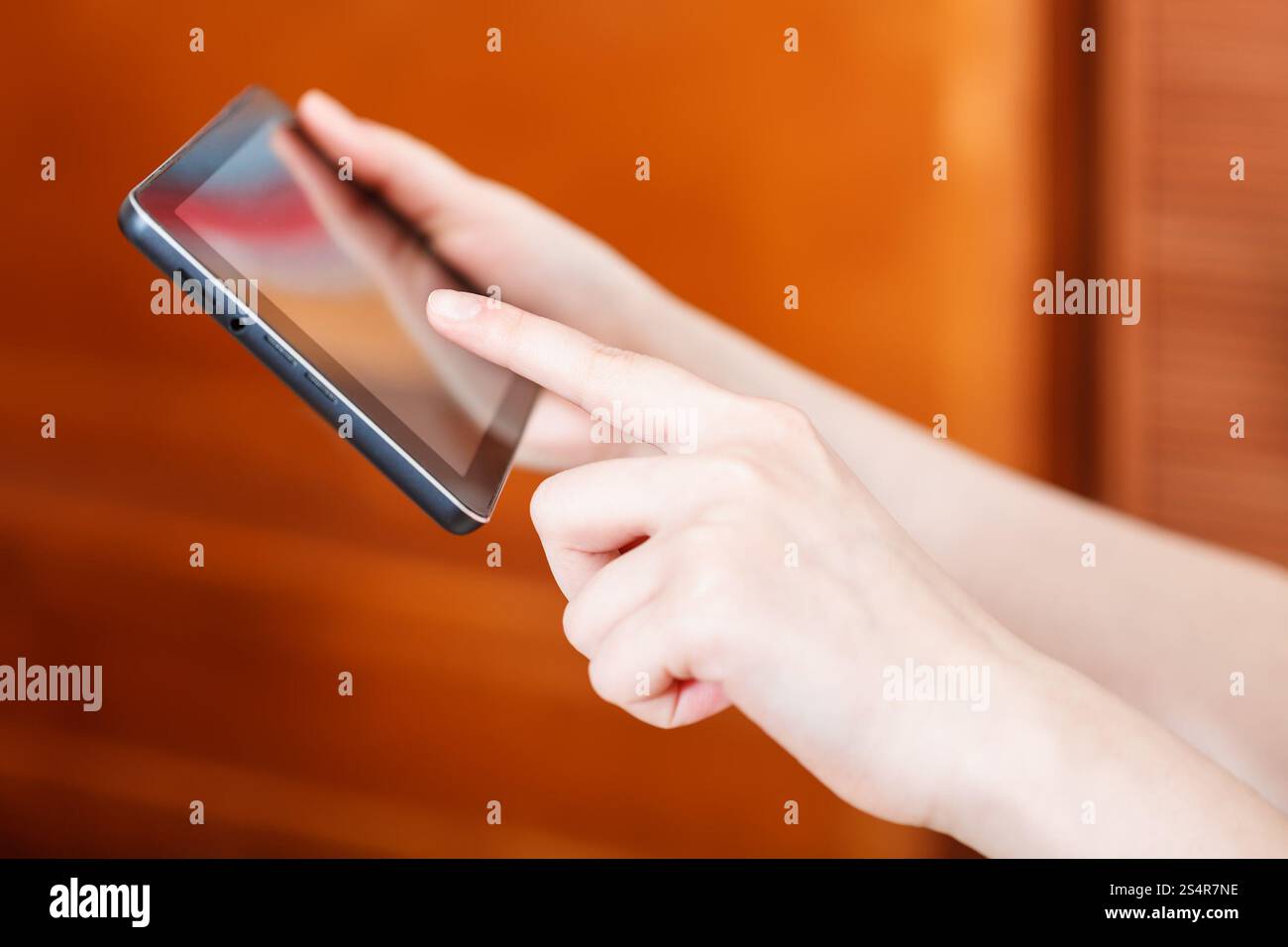 finger touching touchpad screen in office Stock Photo - Alamy