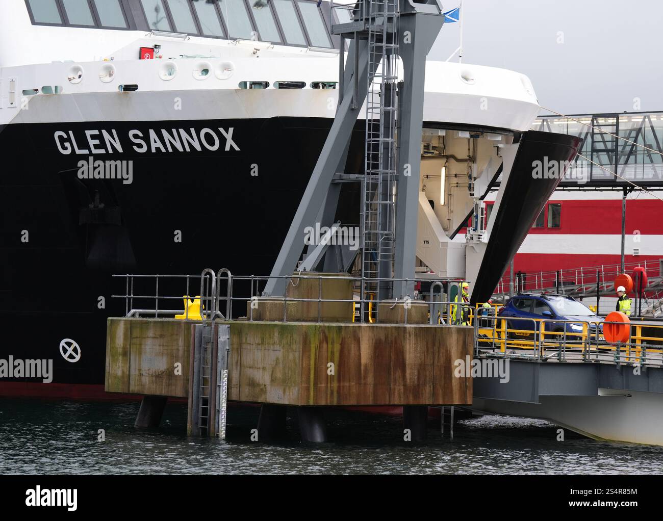 Vehicles leave The Glen Sannox ferry after arriving in Brodick on Isle ...