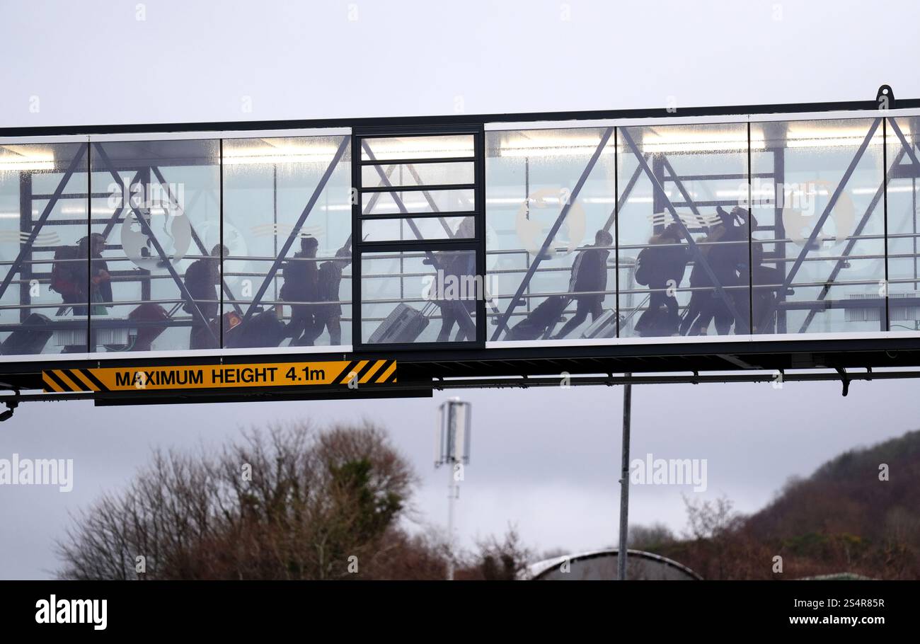Passengers leave The Glen Sannox ferry after arriving in Brodick on ...