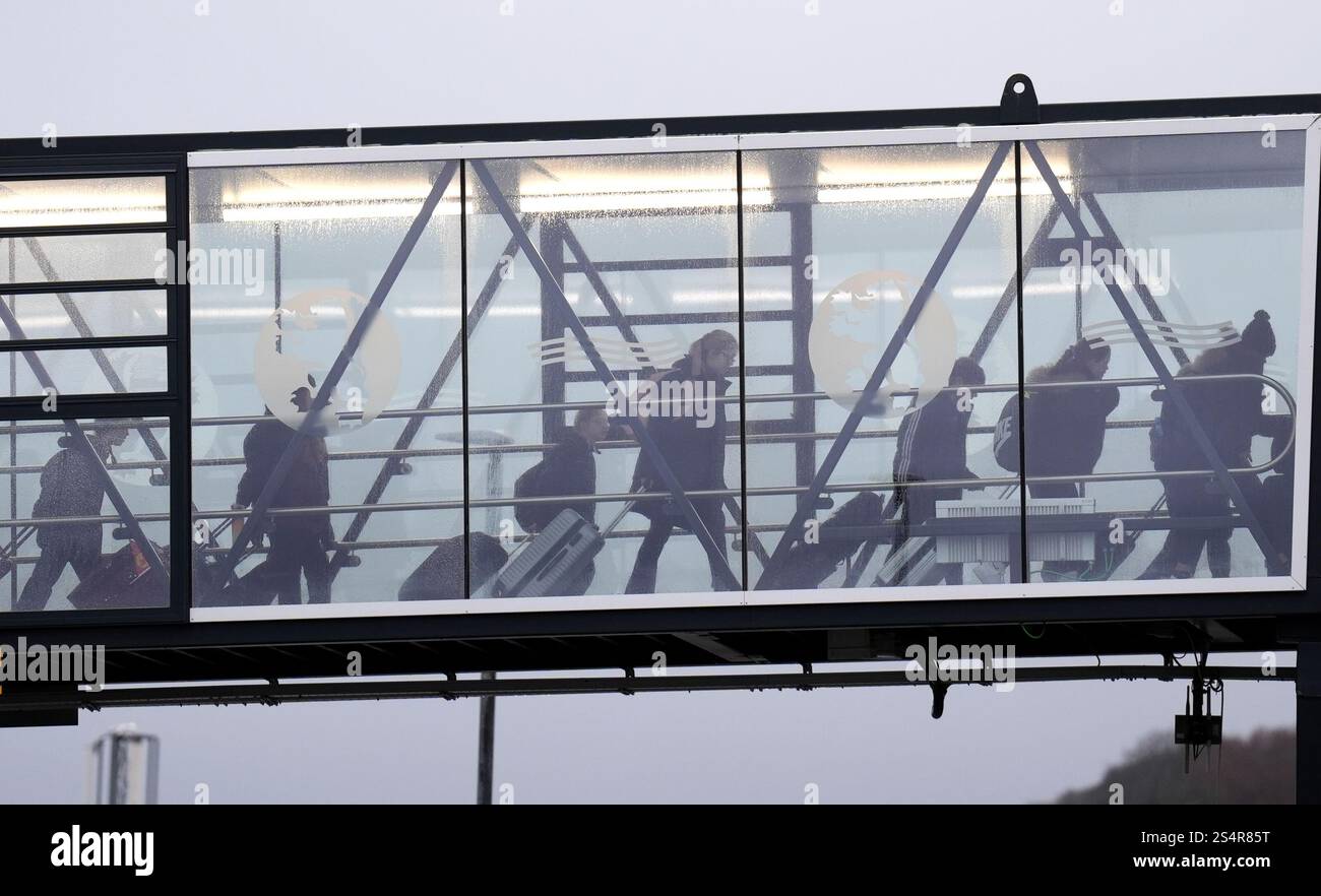 Passengers leave The Glen Sannox ferry after arriving in Brodick on ...