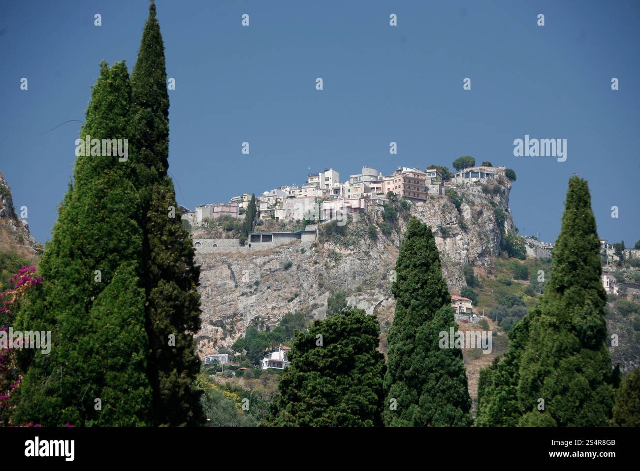 The mountain Village of Castelmola over the old Town of Taormina in ...