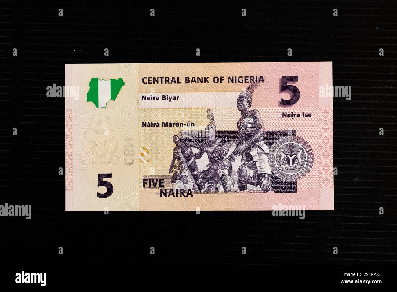 Nigeria five naira banknote reverse side of the note is a depiction of ...