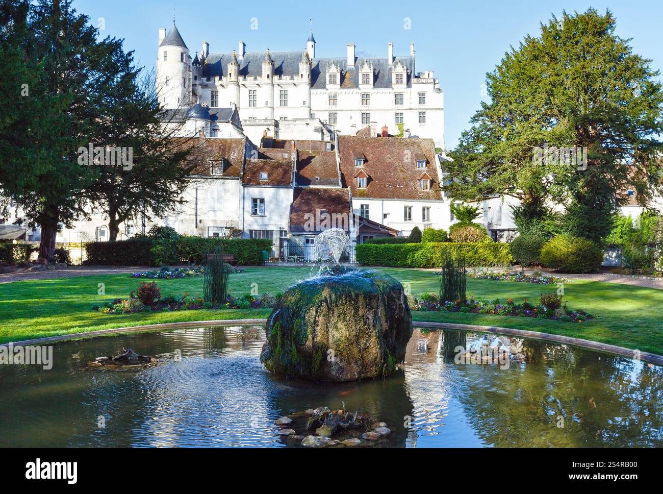 Fountain in spring public park in Loches town (France) and castle ...