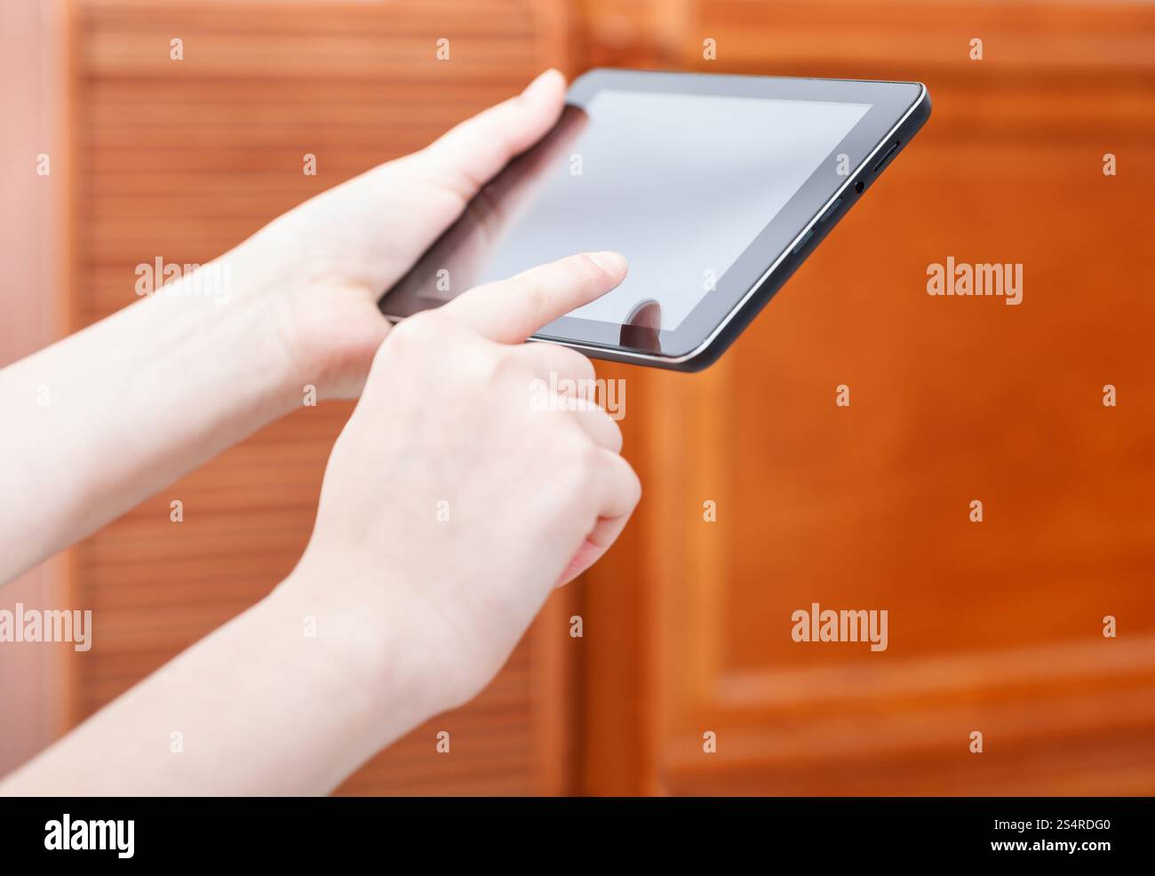 finger clicking touchpad screen in an office Stock Photo - Alamy