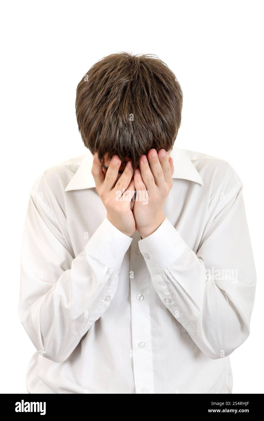 Sad Young Man On the White Background hide his Face Stock Photo - Alamy
