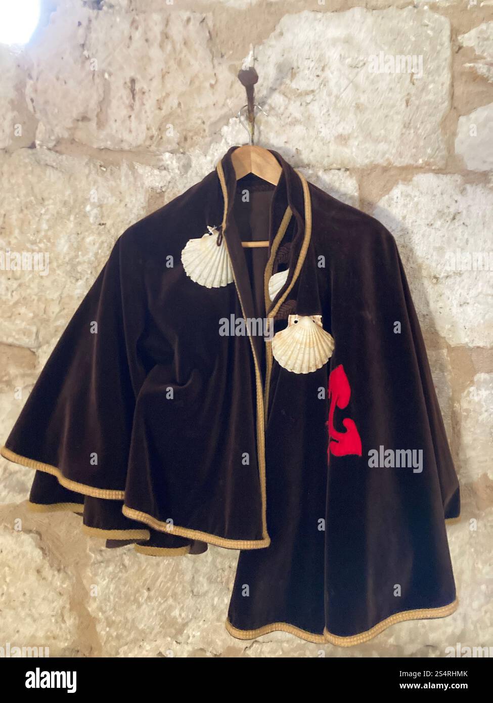 Black cape and St. Jacques' shell at St. Nicholas Monastery, Hospital ...