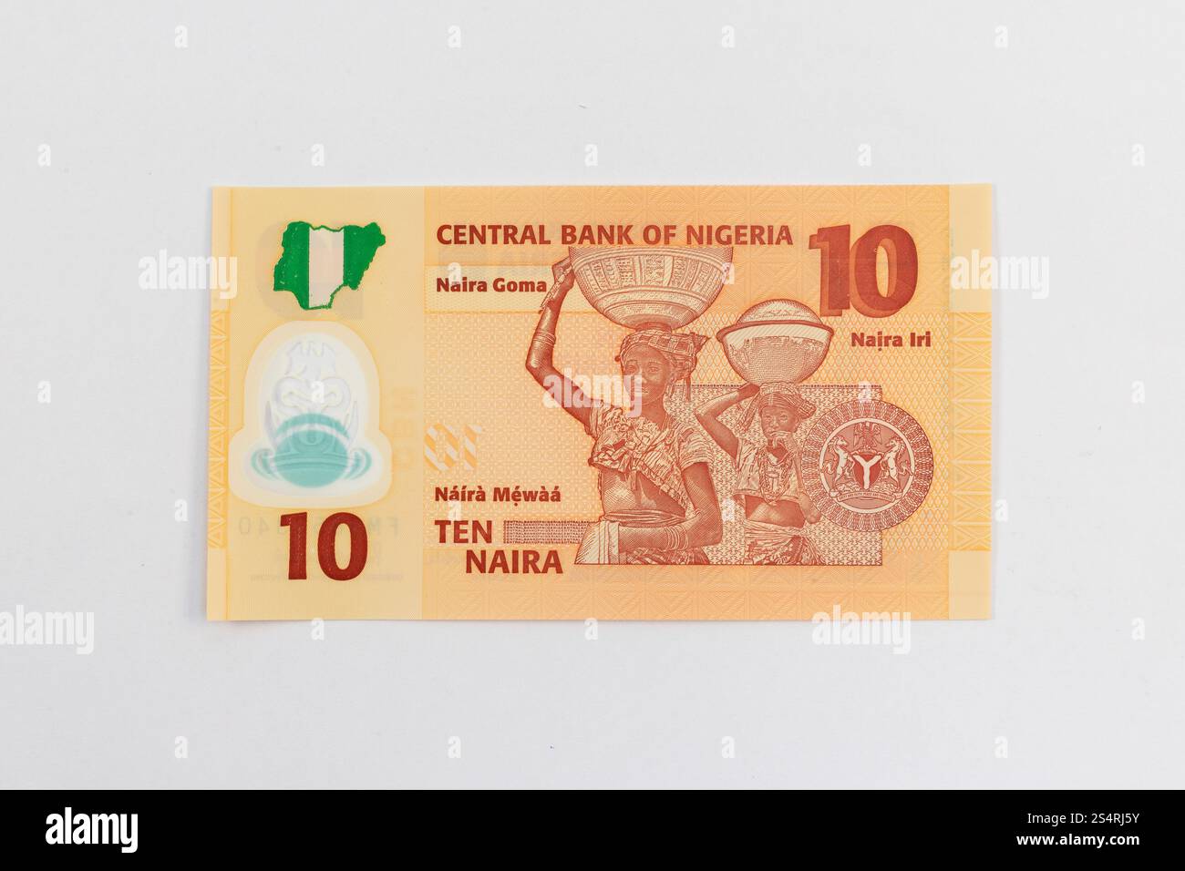 Nigeria ten naira banknote reverse side features two women carrying ...