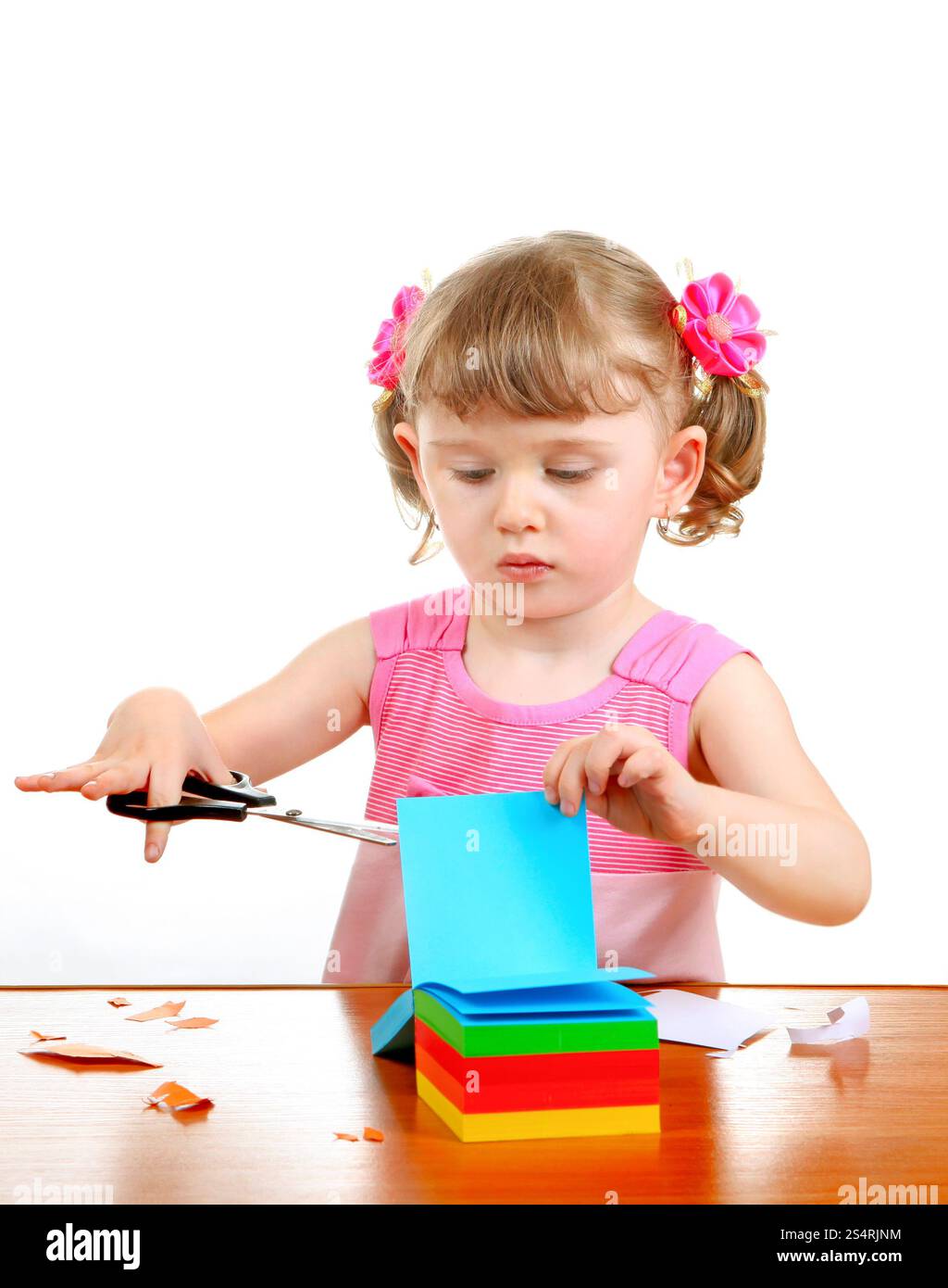 Little Girl with Scissors at the nursery class. On the white Background ...