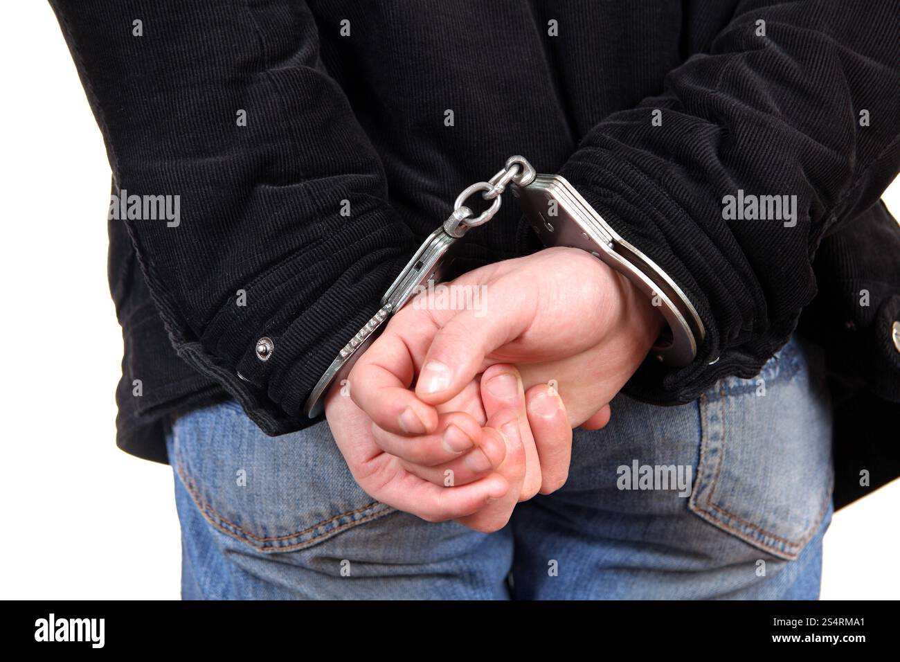 Rear view of the Man in Handcuffs on the White Background Closeup Stock ...