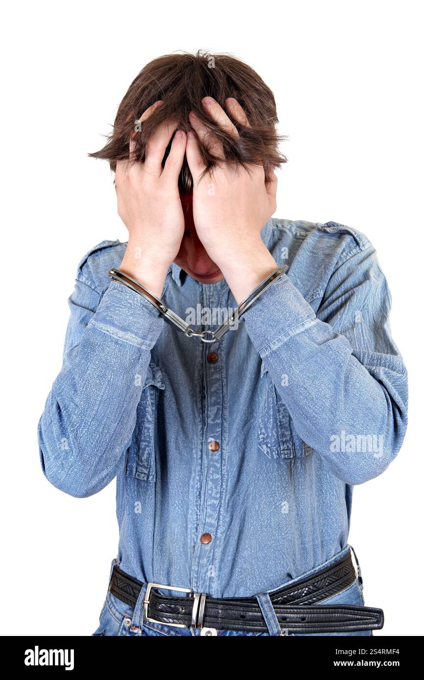 Portrait of Troubled and Sorrowful Man in Handcuffs Stock Photo - Alamy